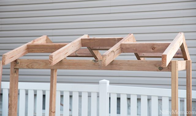 How to Make a Roofed Log Rack {Backyard Project} – Nifty Mom